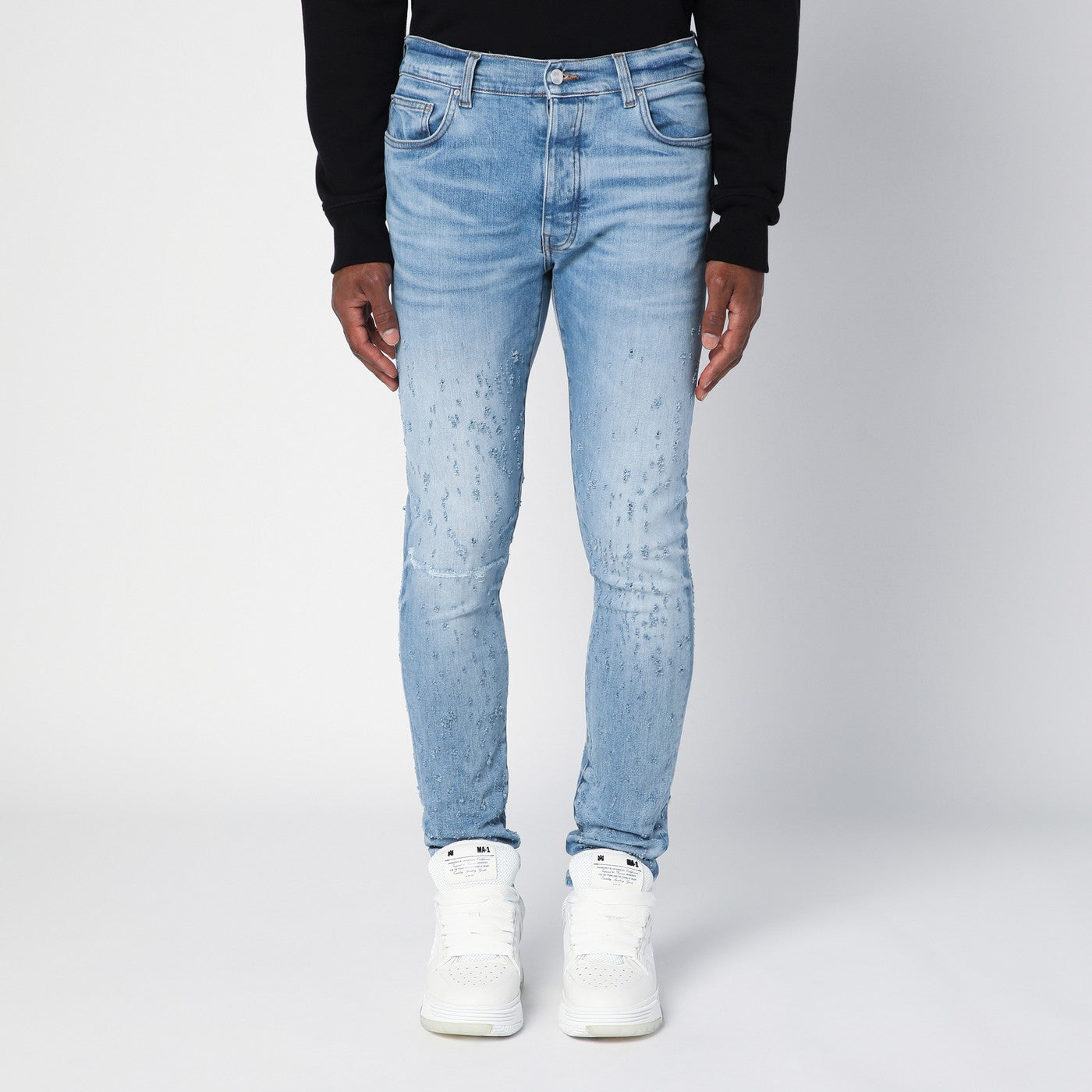 Amiri Light Blue Washed Skinny Jeans With Wear – Balardi